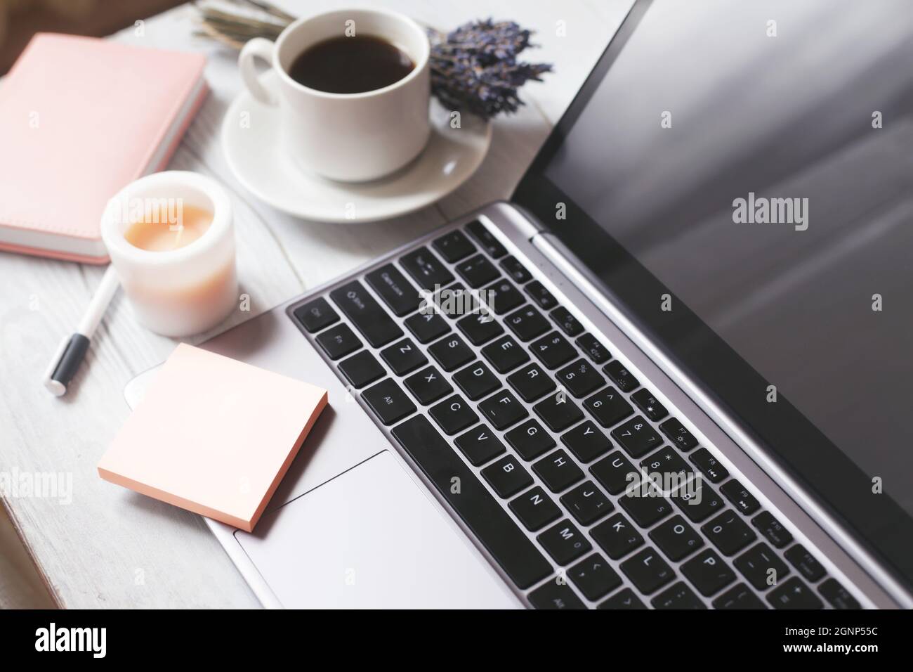 Laptop and a cup of coffee. Workplace concept Stock Photo - Alamy