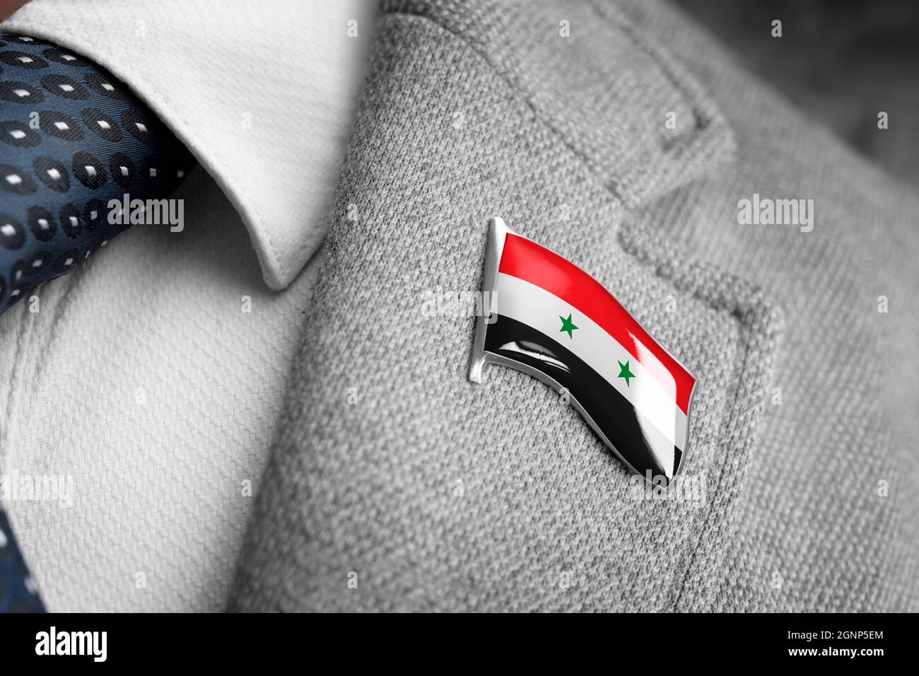 Metal badge with the flag of Syria on a suit lapel Stock Photo - Alamy