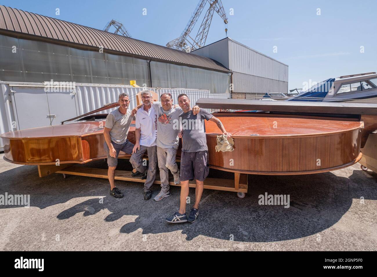 The launching of the violin-shaped boat Stock Photo - Alamy
