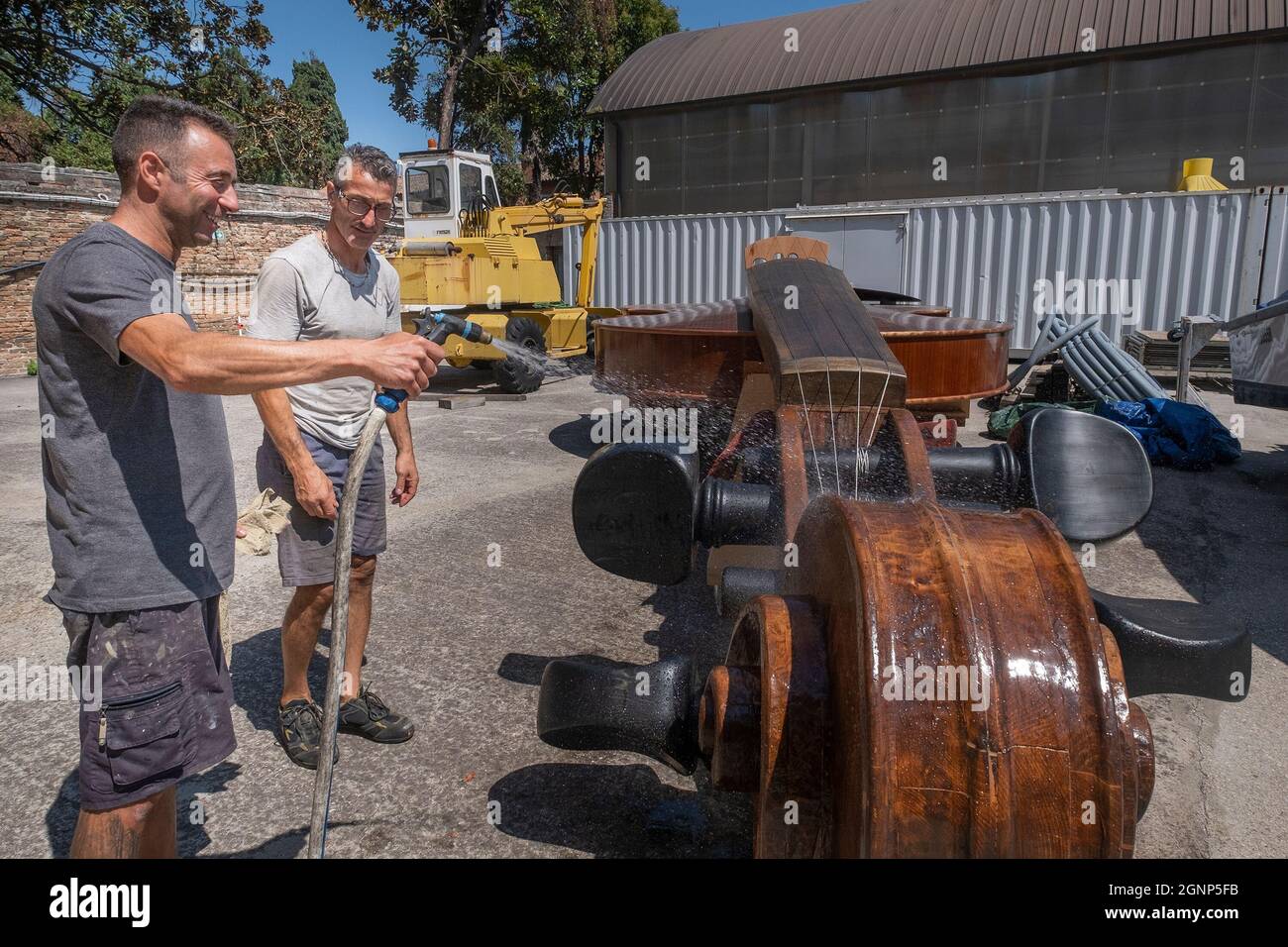 The launching of the violin-shaped boat Stock Photo - Alamy