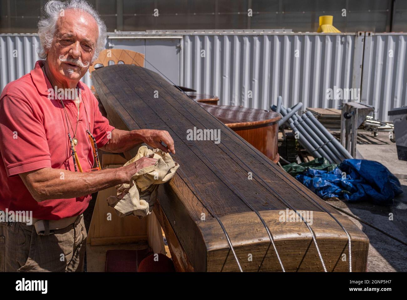The launching of the violin-shaped boat Stock Photo - Alamy