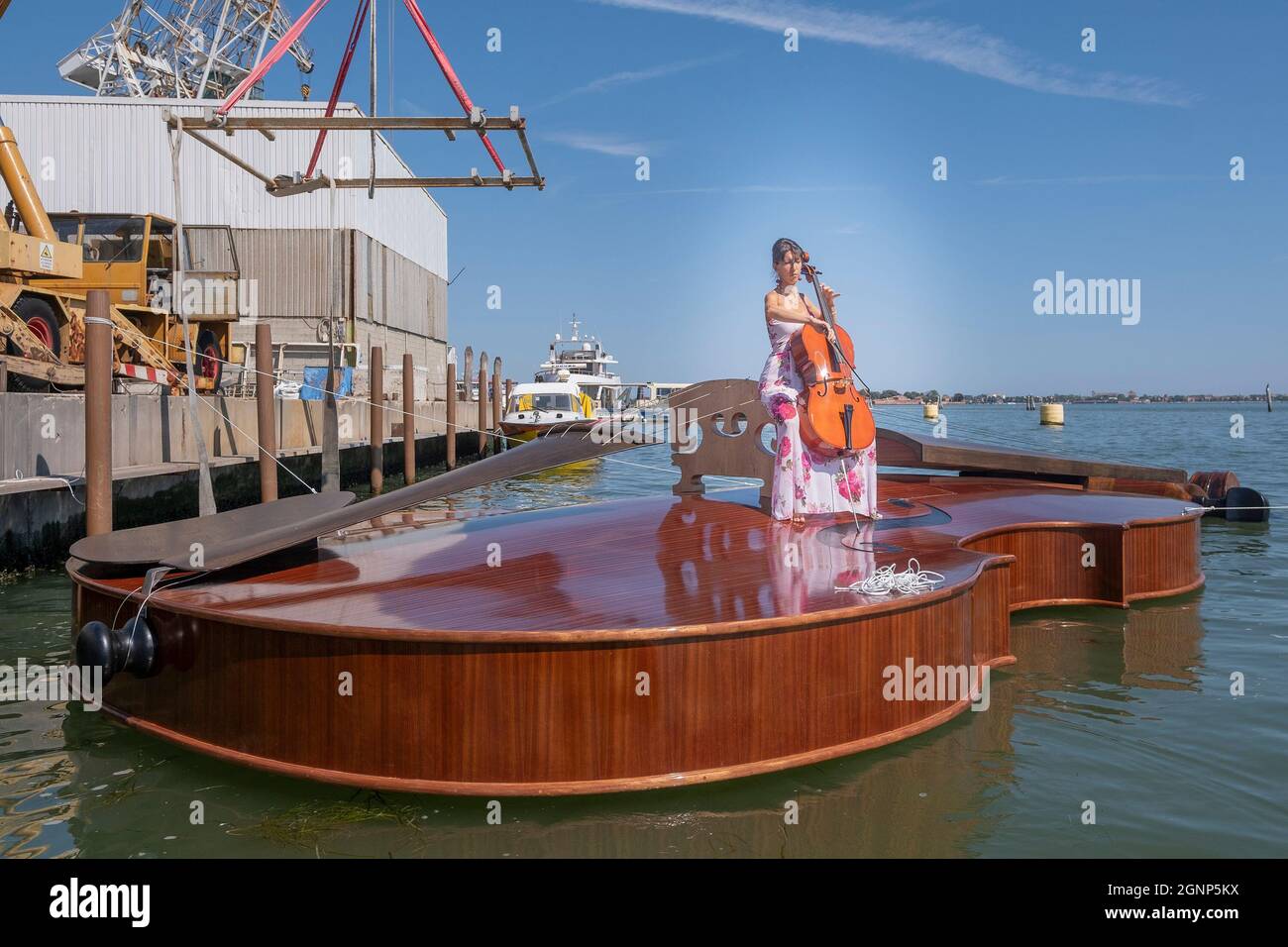 The launching of the violin-shaped boat Stock Photo - Alamy
