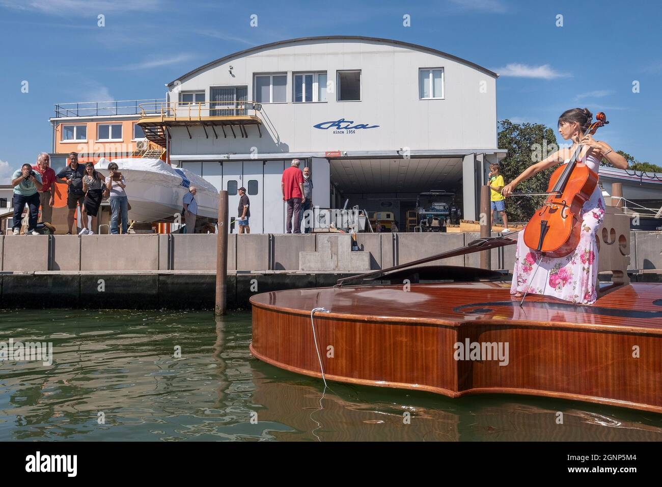 The launching of the violin-shaped boat Stock Photo - Alamy