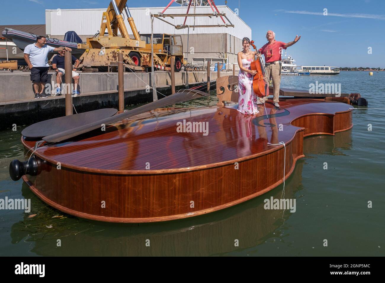 The launching of the violin-shaped boat Stock Photo - Alamy