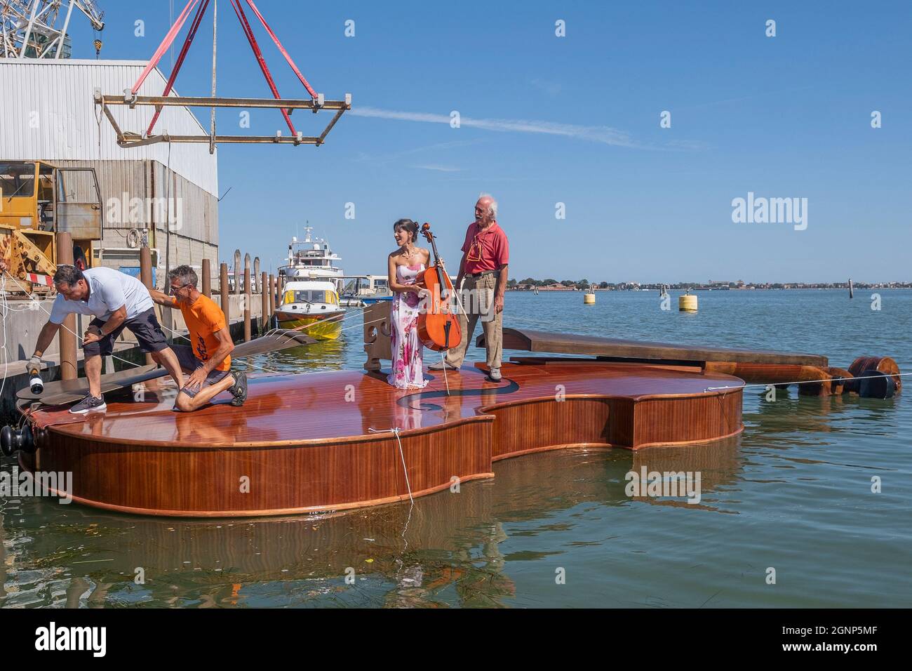 The launching of the violin-shaped boat Stock Photo - Alamy