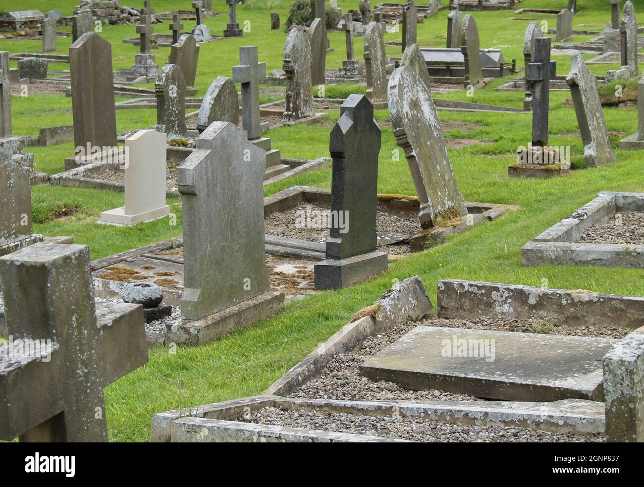 The Headstones and Graves of an Old Church Cemetery Stock Photo - Alamy