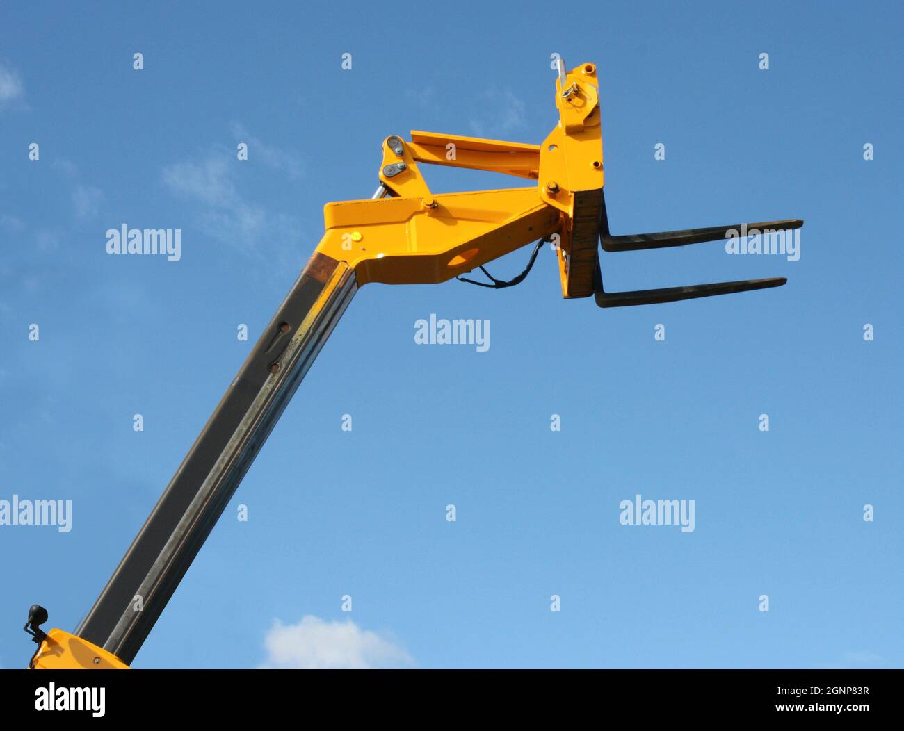 The Top of a High Lift Yellow Hydraulic Fork Lift Truck Stock Photo - Alamy