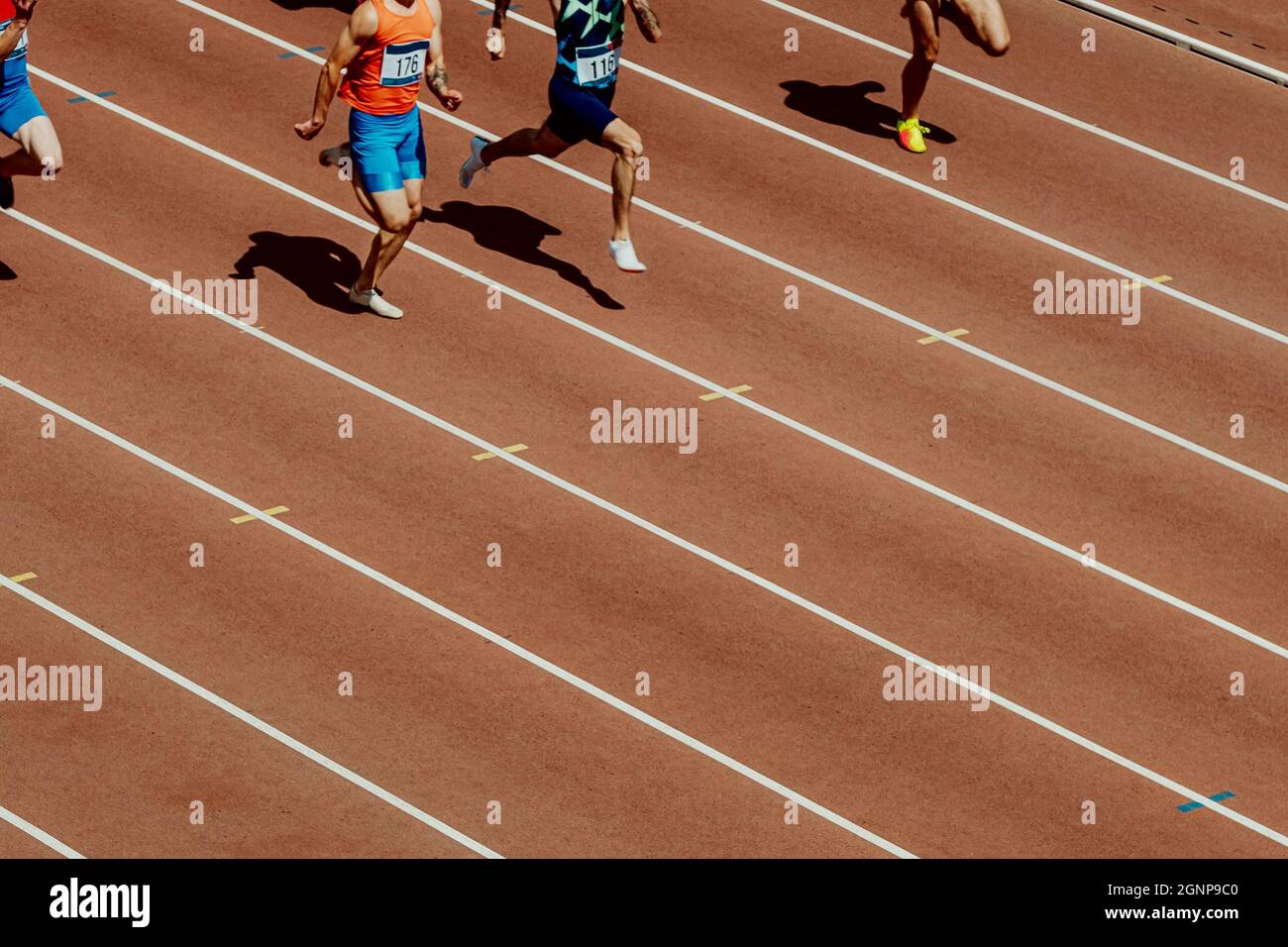 group of athletes runners run sprint race at stadium Stock Photo - Alamy