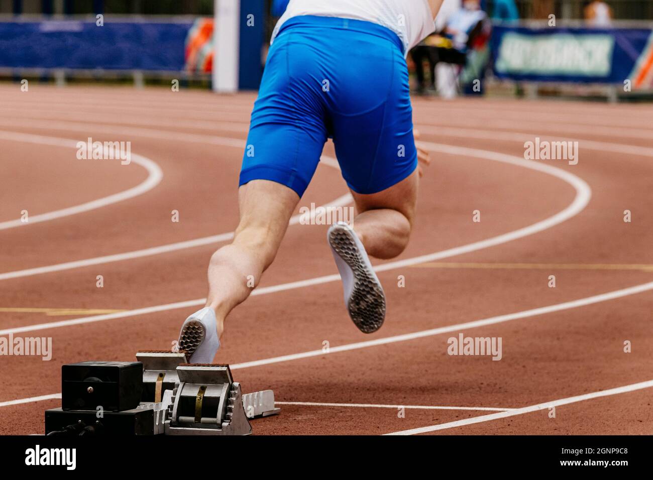 athlete runner start from starting blocks to run sprint race Stock ...