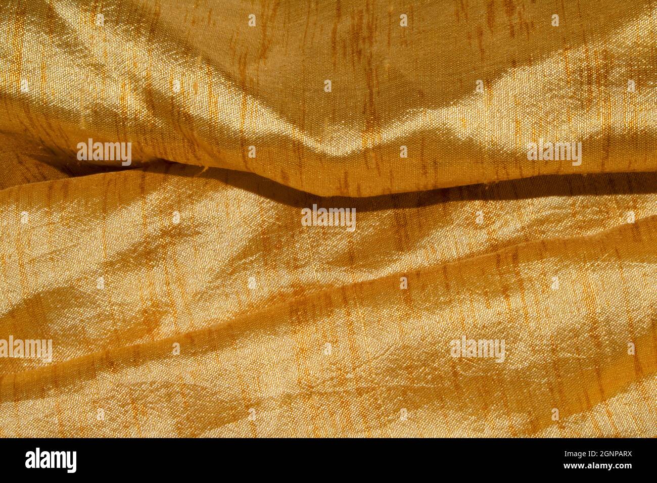 A Golden Copper Fabric Shiny Background Stock Photo - Alamy