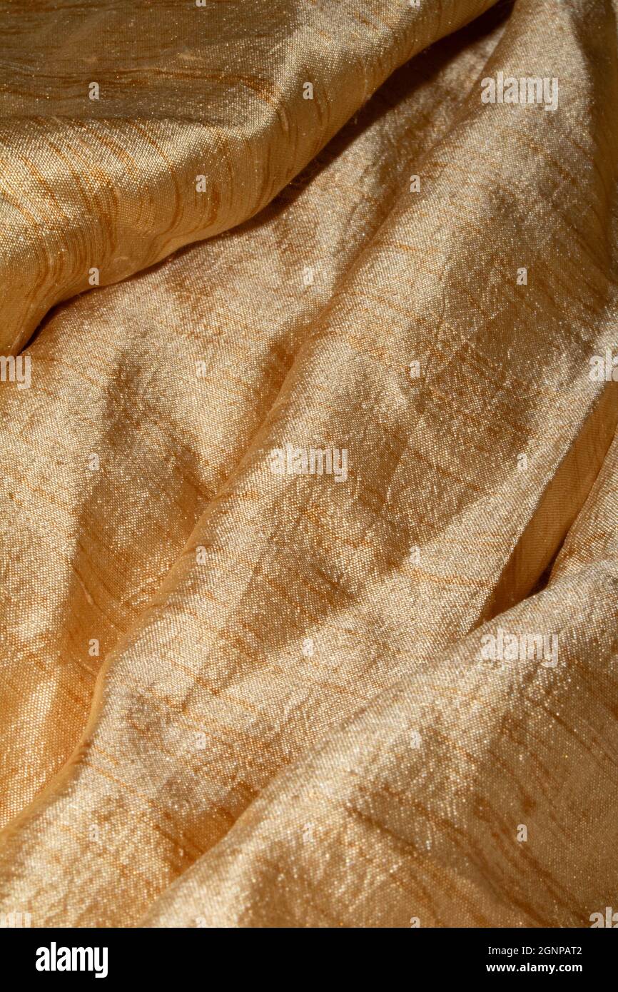 A Golden Copper Fabric Shiny Background Stock Photo - Alamy