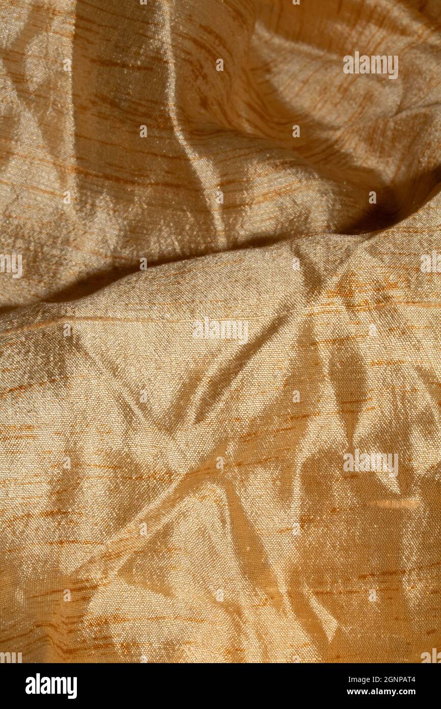 A Golden Copper Fabric Shiny Background Stock Photo - Alamy