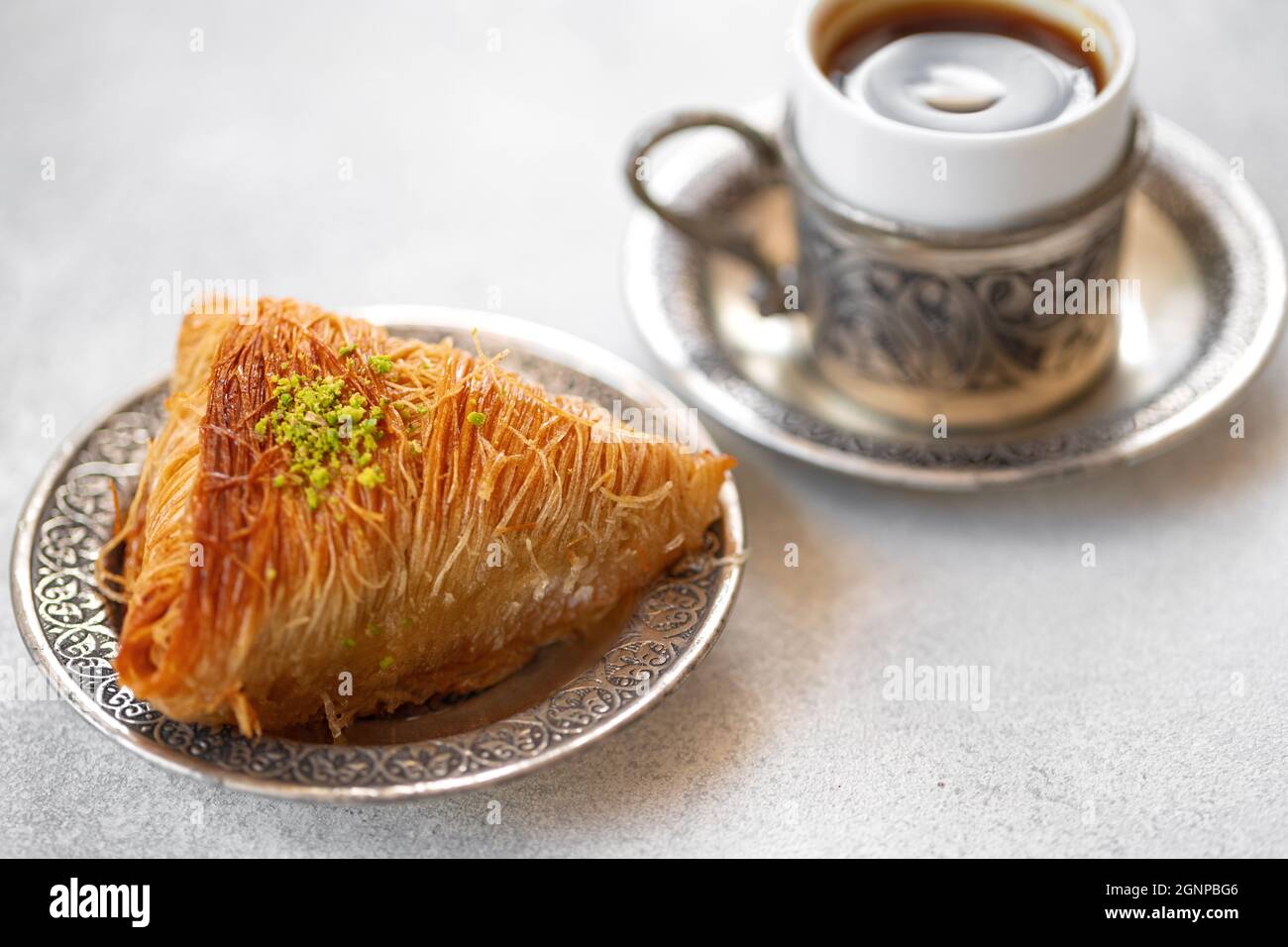 Small cup of Turkish coffee and Turkish baklava Stock Photo - Alamy