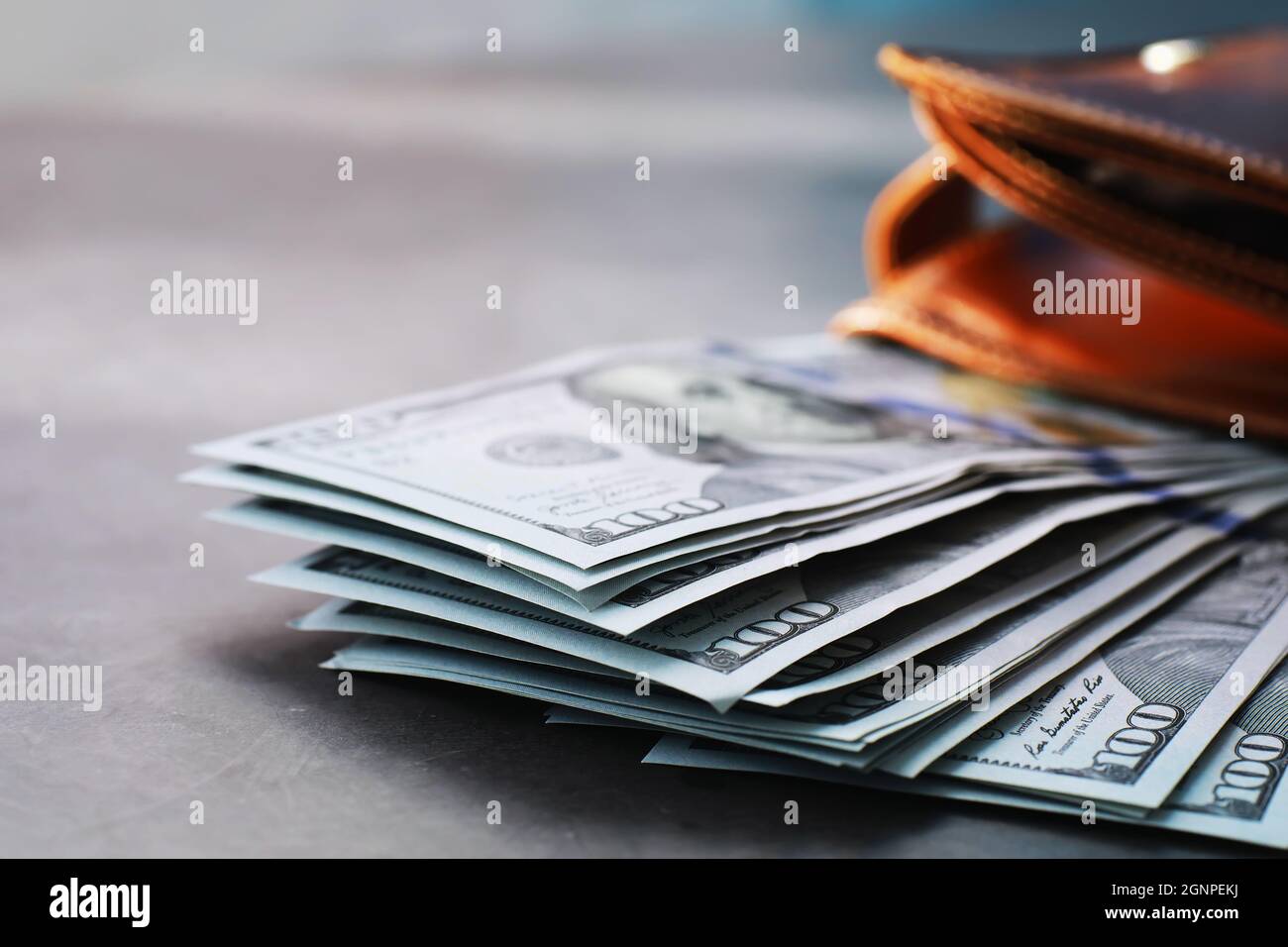 Cash money in a large pile as a finance background. Paper money close ...