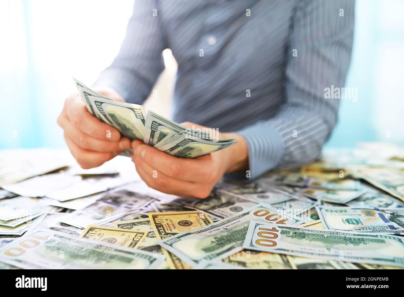 Cash money in a large pile as a finance background. Paper money close ...