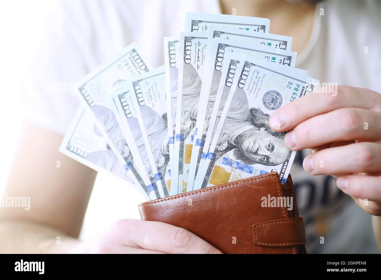 Cash money in a large pile as a finance background. Paper money close ...