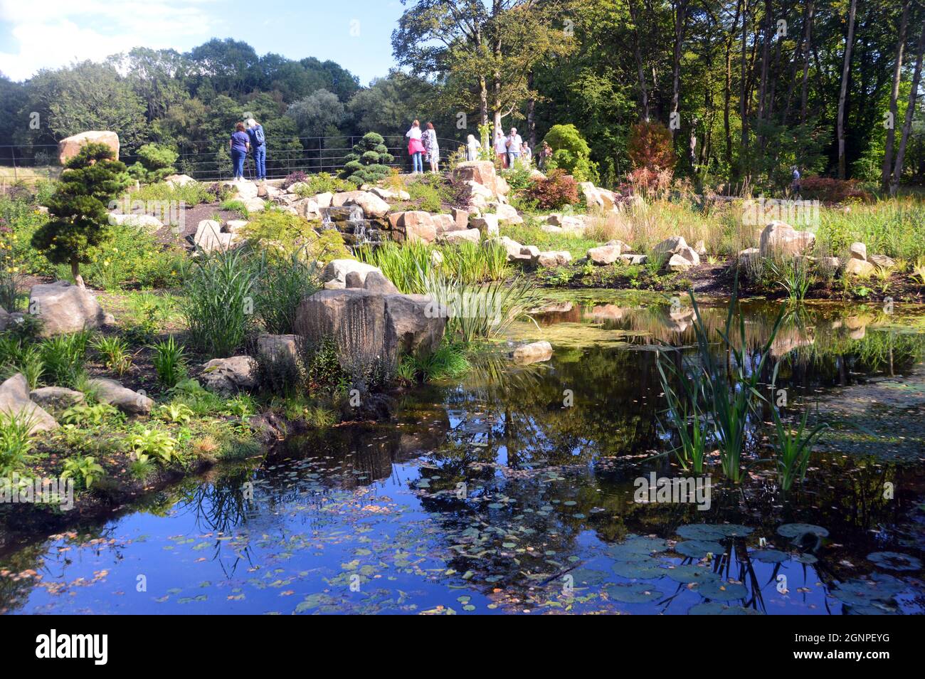 People by the Pond at the Chinese Streamside Garden at RHS Garden ...