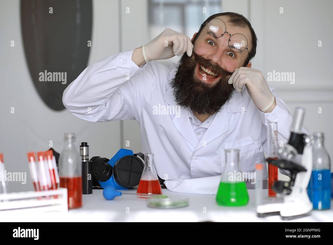 Chemist crazy. A mad scientist conducts experiments in scientific ...