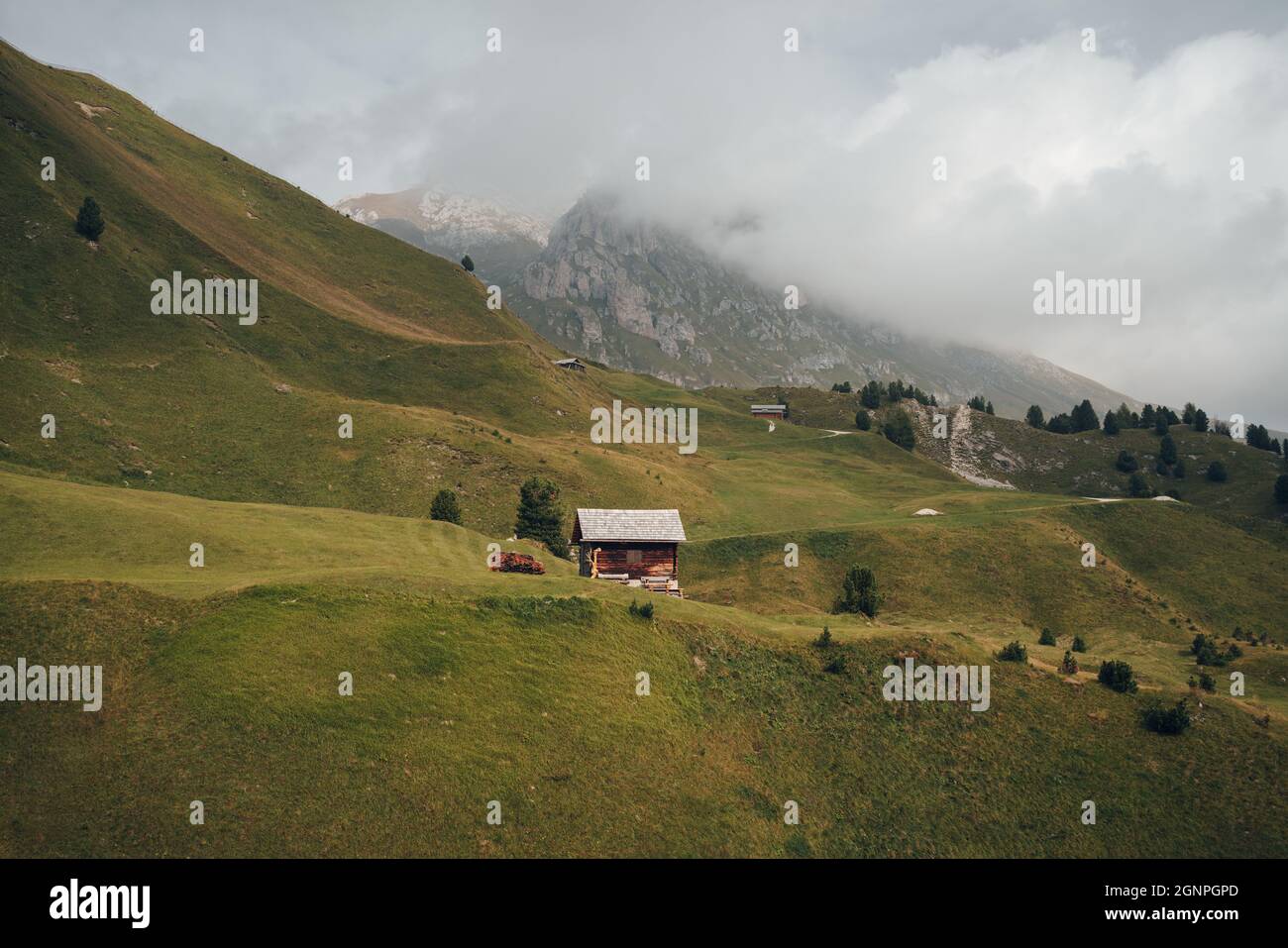 Alpine huts on Hill Stock Photo - Alamy