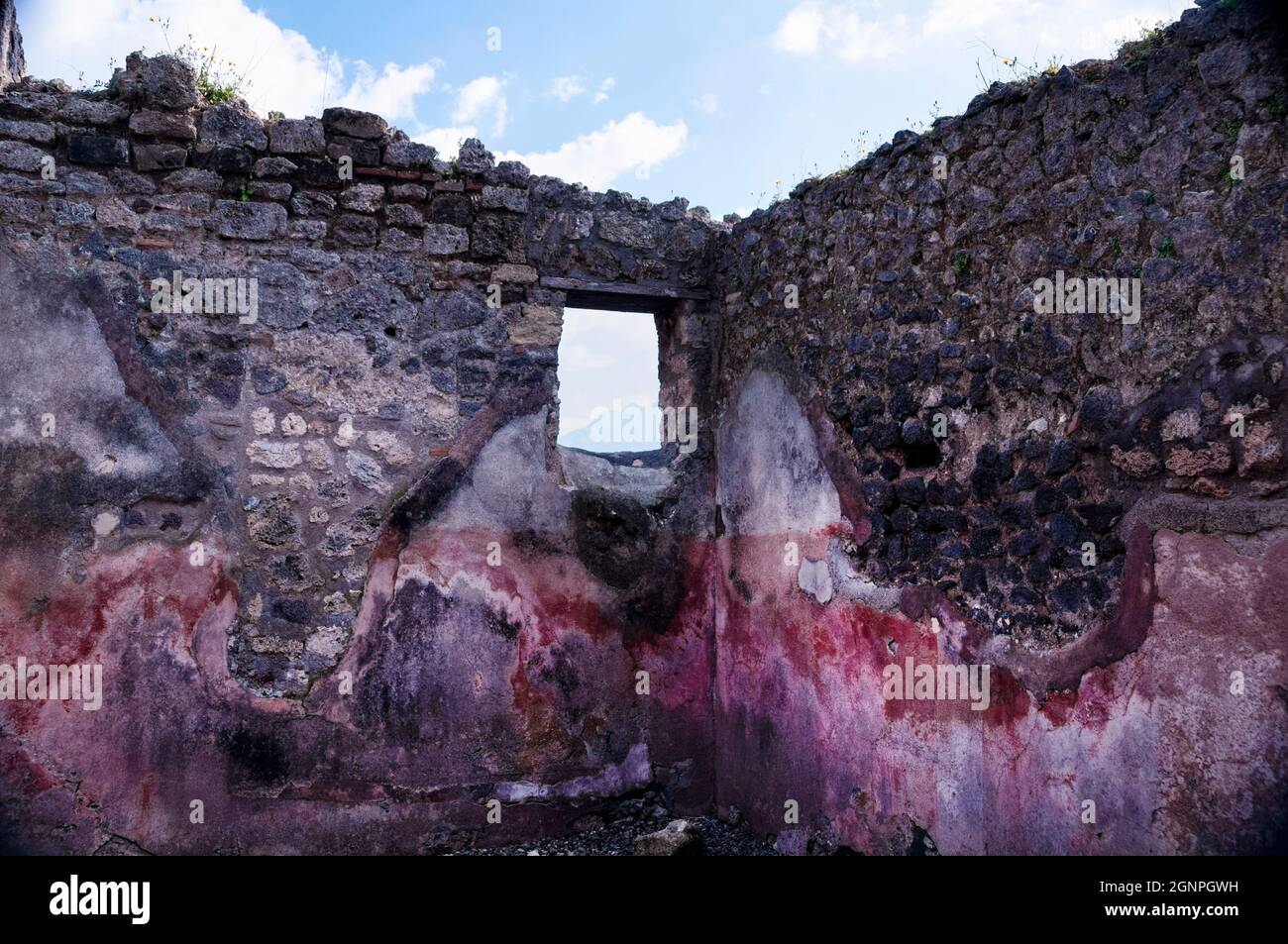 The remains of an interior wall at the Archaeological Park of Pompeii ...