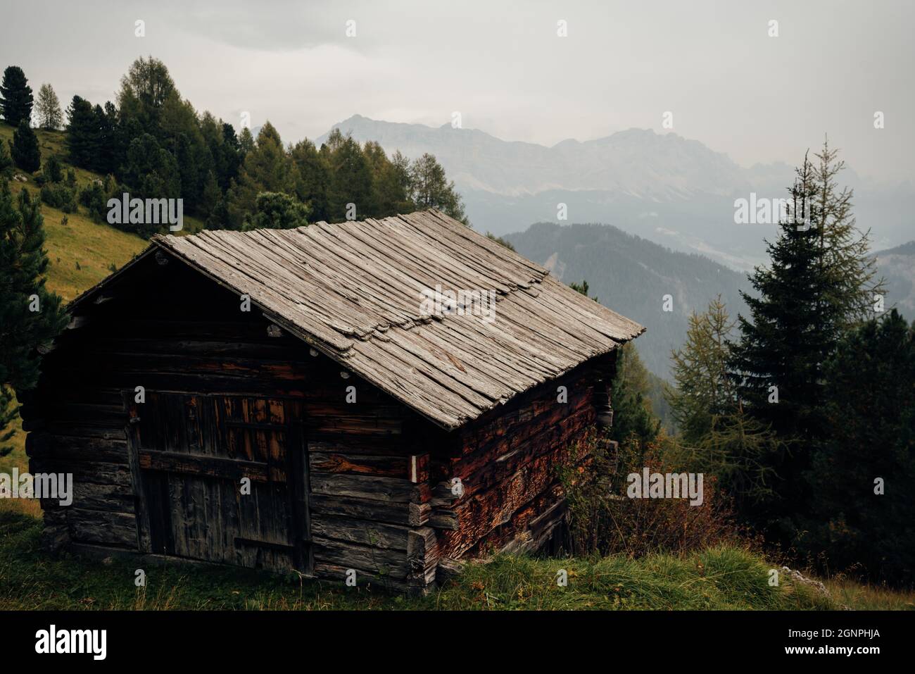 Alpine huts on Hill Stock Photo - Alamy