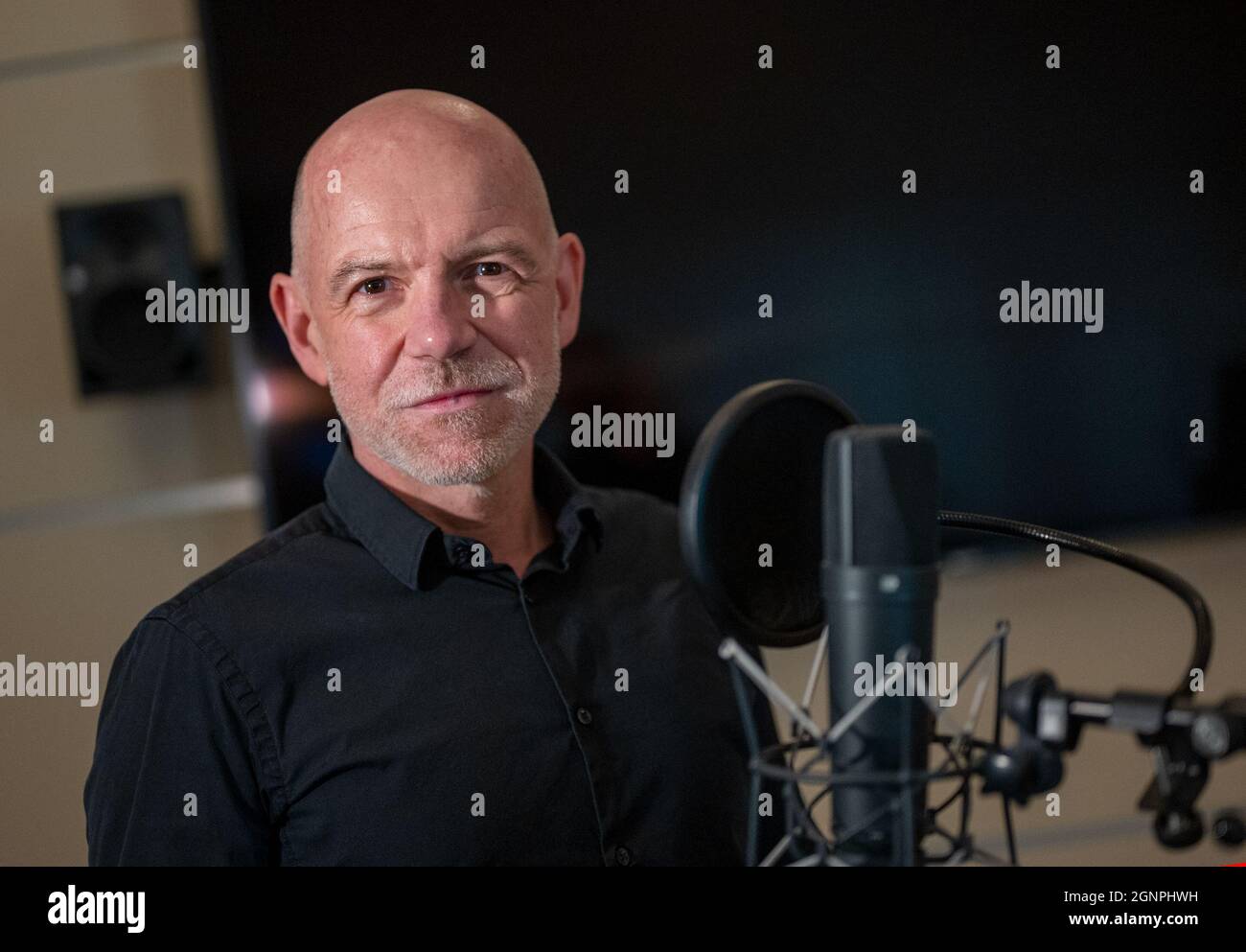 PRODUCTION - 24 September 2021, Berlin: Dietmar Wunder, voice actor ...
