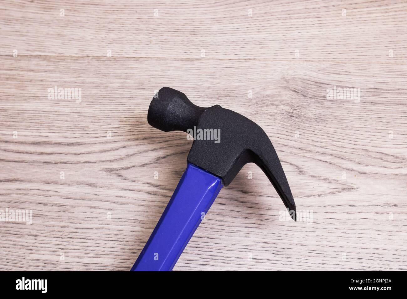 Claw hammer on blue hi-res stock photography and images - Alamy