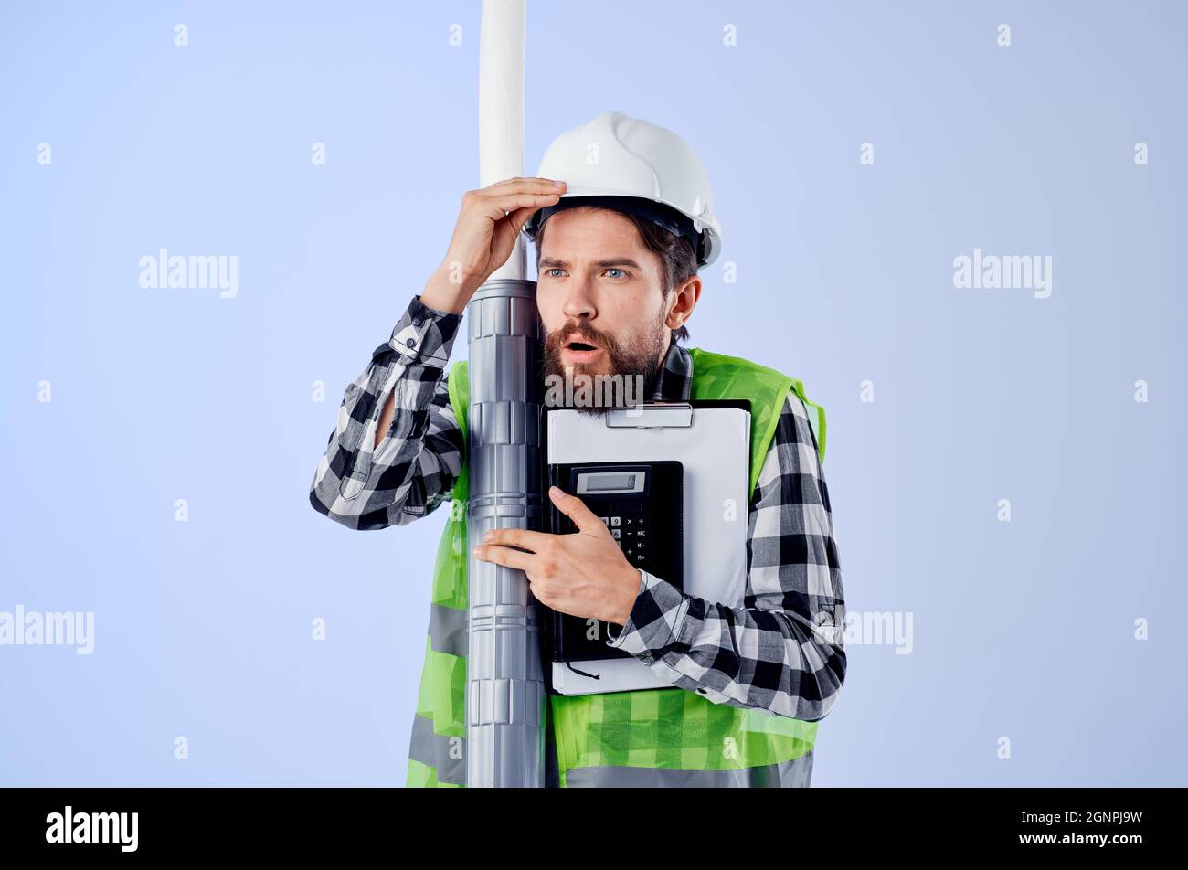 engineer in a white helmet blueprints Professional blue background ...