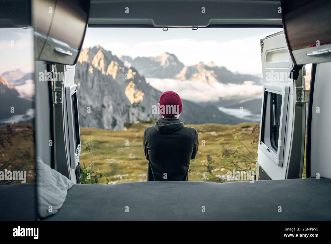 Man with camping van infront of Mountain Stock Photo - Alamy