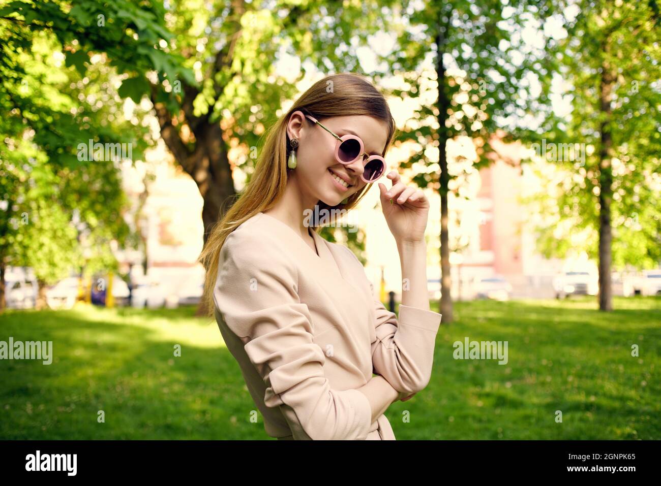 beautiful woman walk in the park this summer model Stock Photo - Alamy