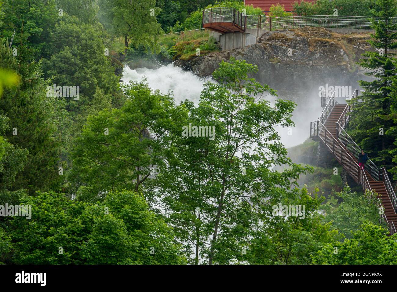 GEIRANGER, NORWAY - 2020 JUNE 21. Iron stairs close to the waterfall in ...