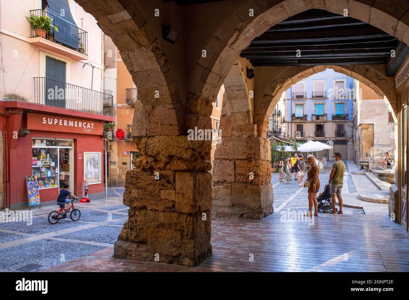 Stone gothic arcades arch at Merceria street near Cathedral Santa Maria ...
