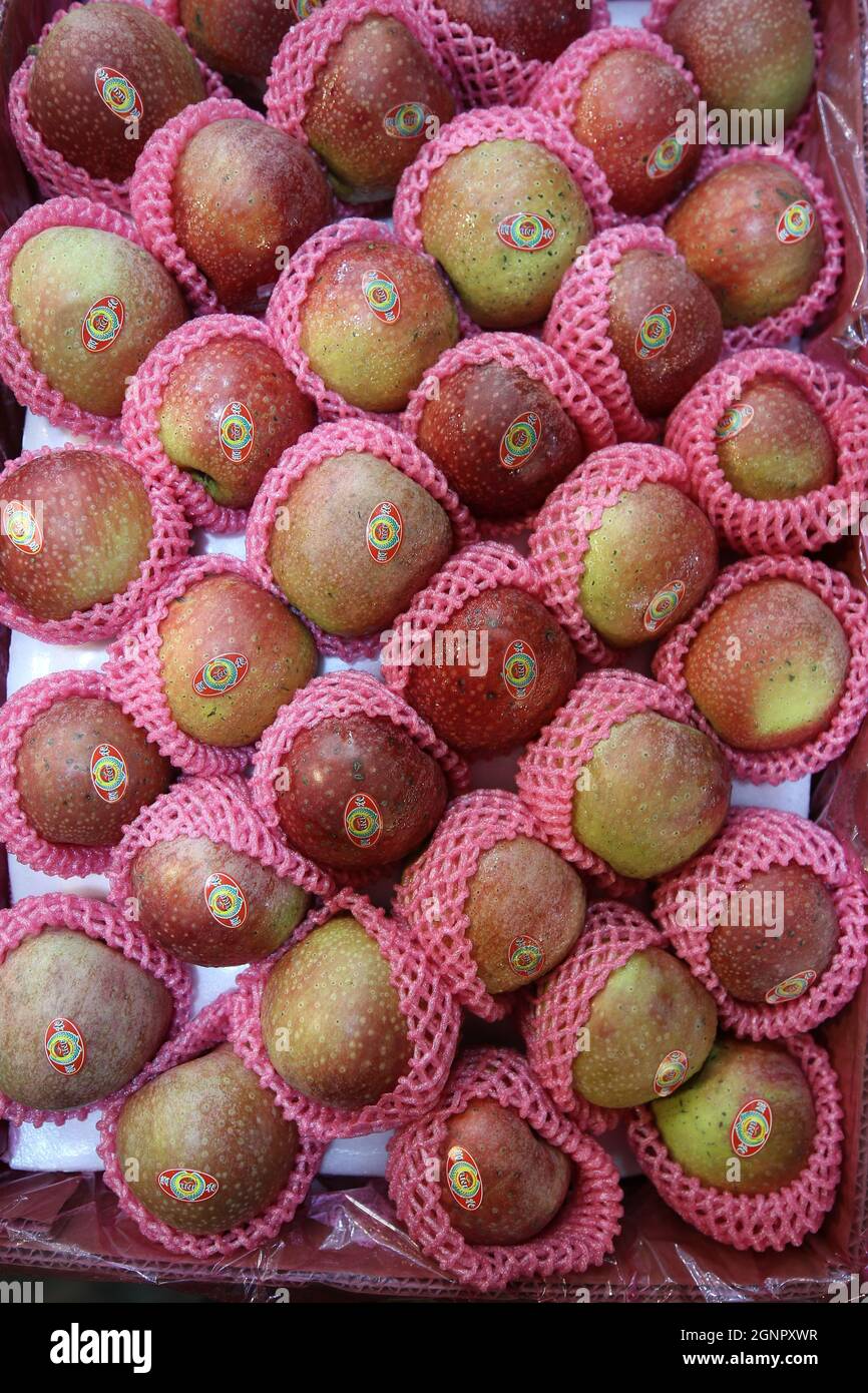 Apple imported from abroad are kept for sales Stock Photo - Alamy