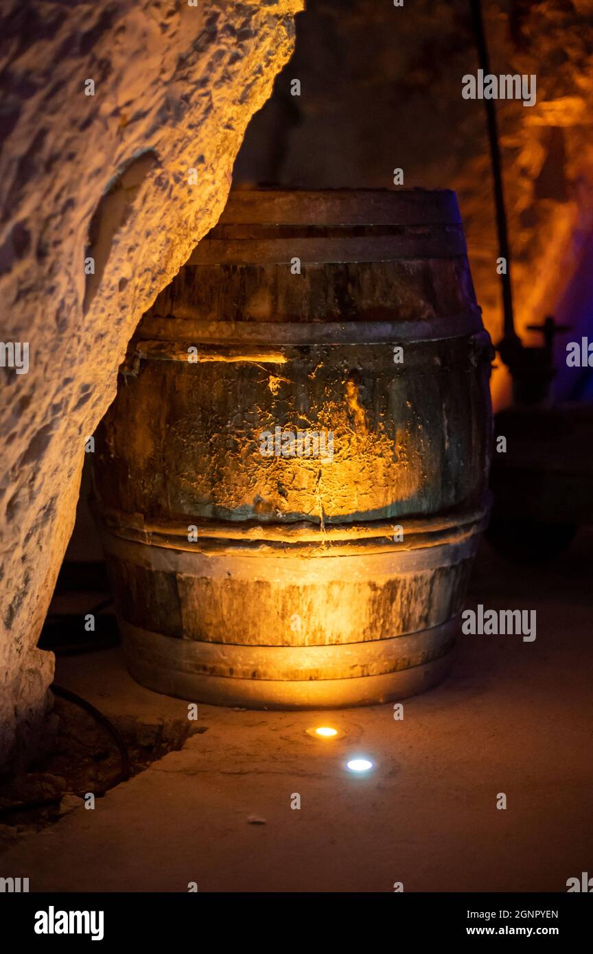 Walking in deep and long undergrounds caves with dusty barrels and ...