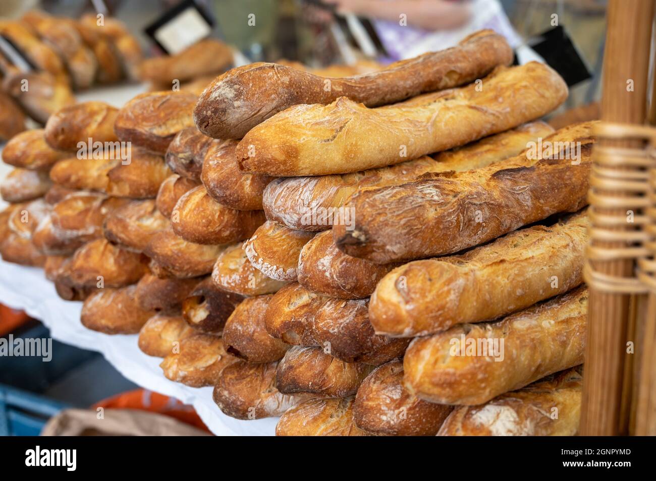 French bakery, many fresh baked baguettes breads ready for sale close ...