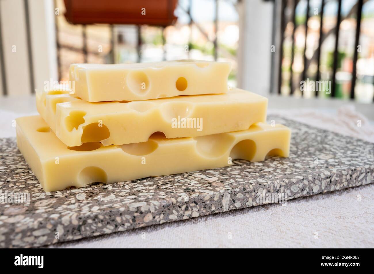 Cheese collection, semi-hard French cheese emmentaler with round holes ...