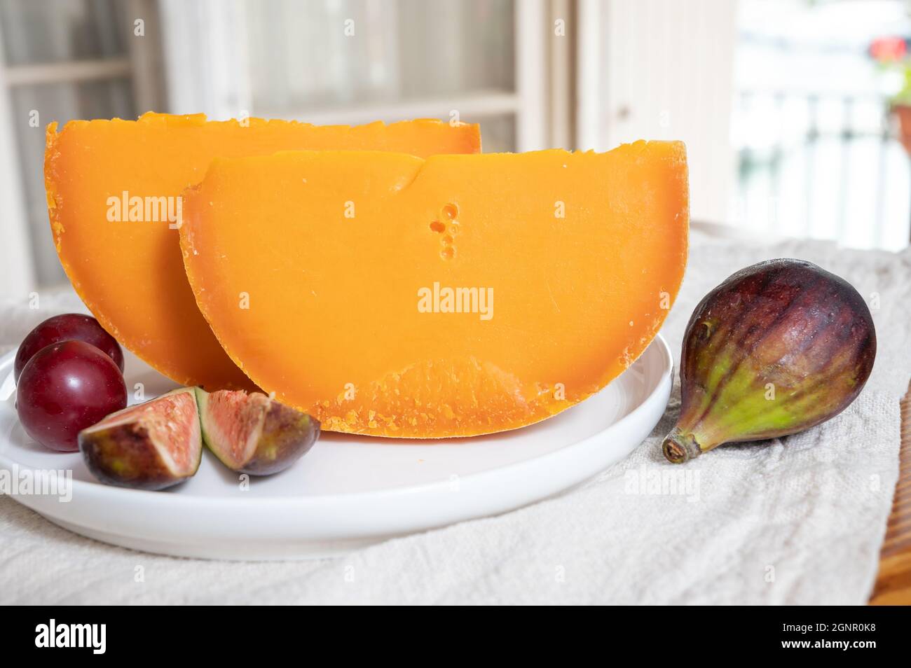 Cheese collection, French yellow cheese mimolette made from cow milk ...