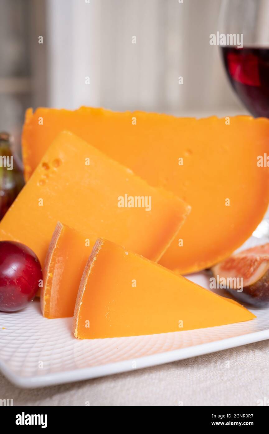 Cheese collection, French yellow cheese mimolette made from cow milk ...