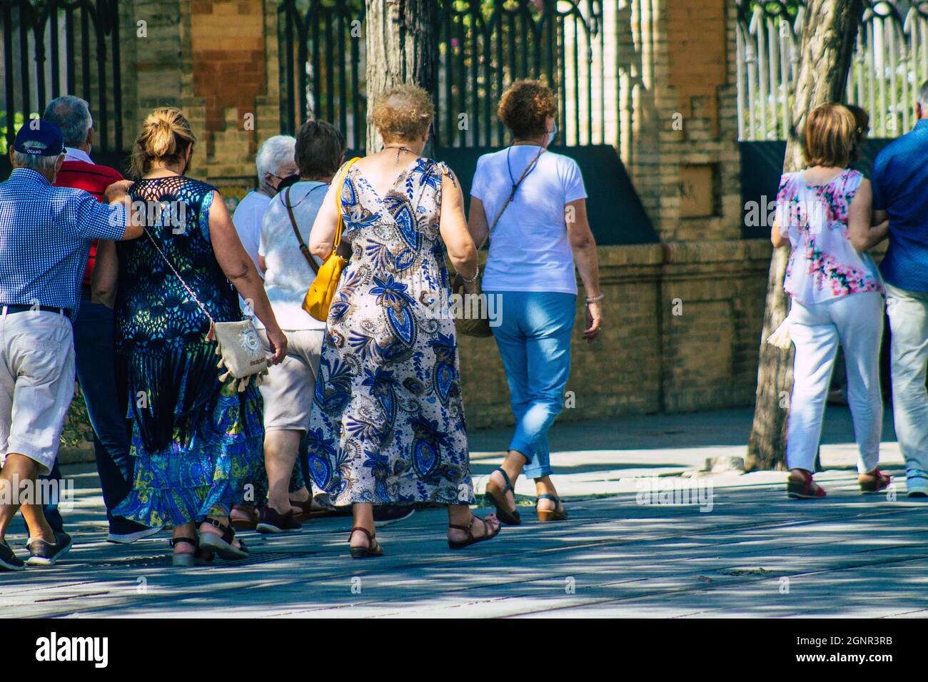 Seville Spain September 22, 2021 Pedestrians walking in the street ...