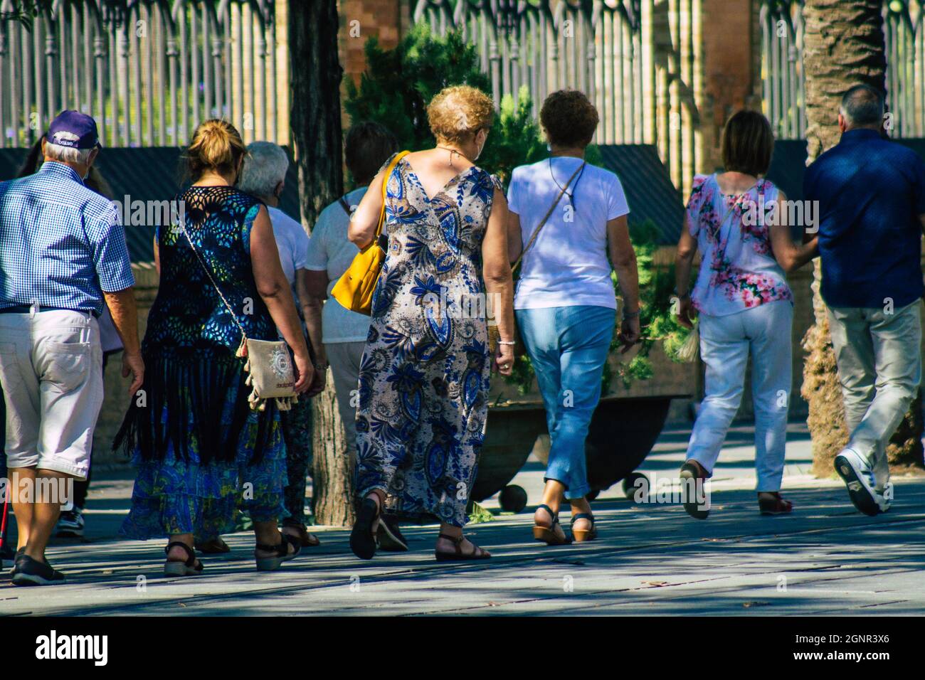 Seville Spain September 22, 2021 Pedestrians walking in the street ...