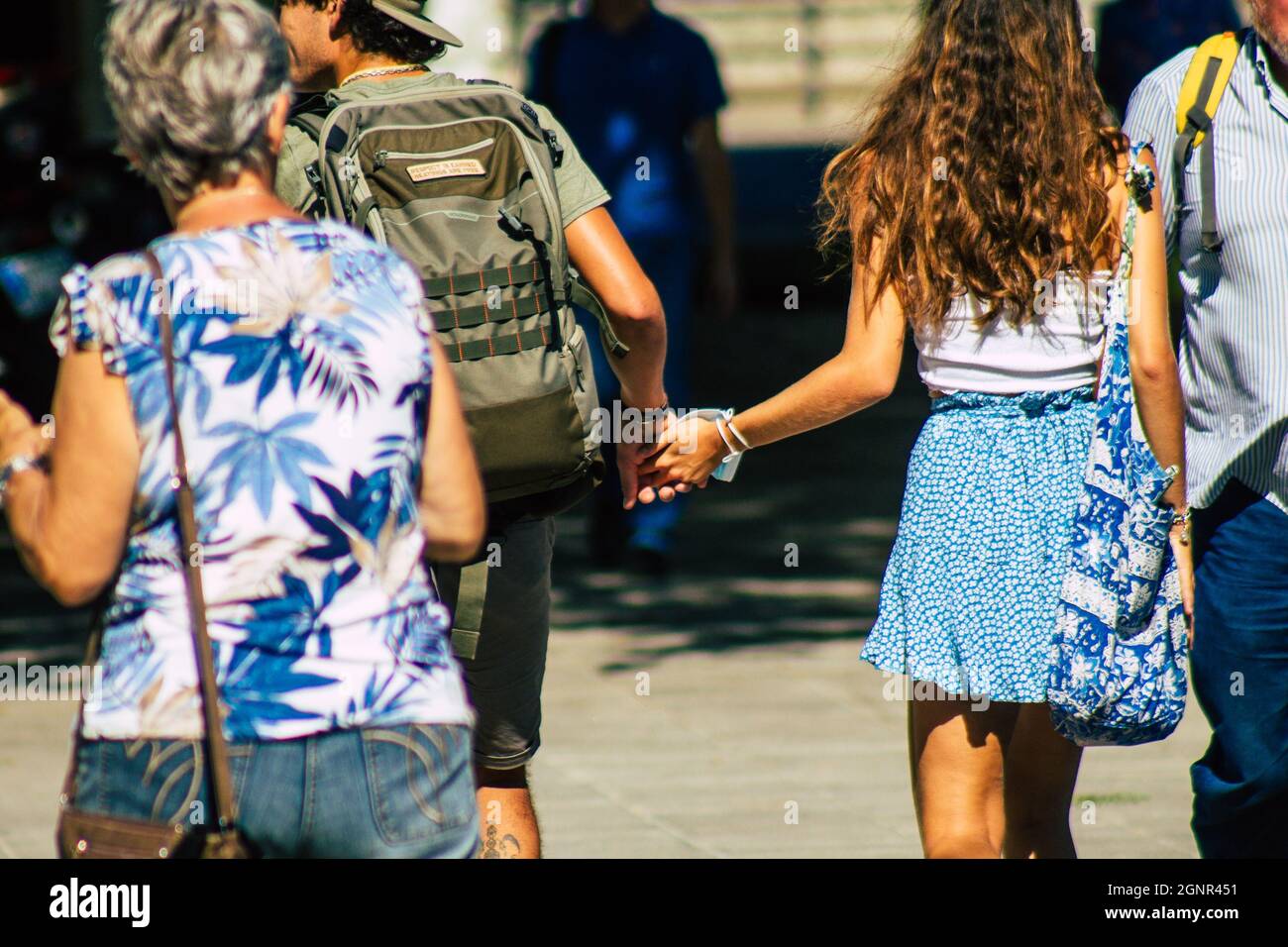 Seville Spain September 22, 2021 Pedestrians walking in the street ...