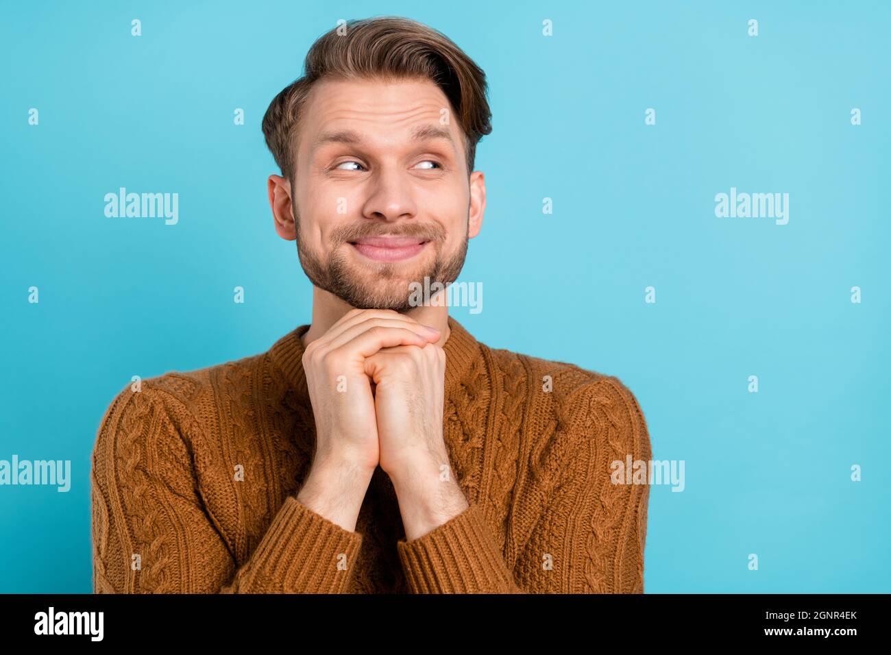 Photo of positive dreamy happy young man look empty space imagine think ...