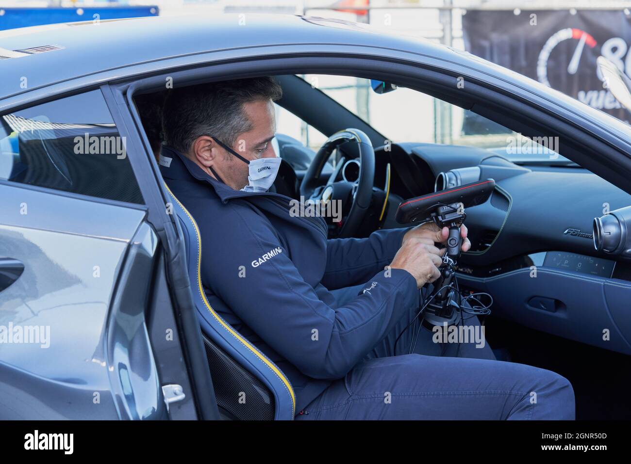 MADRID, SPAIN - Apr 16, 2021: The Driver inside the Ferrari F8 Tributo ...