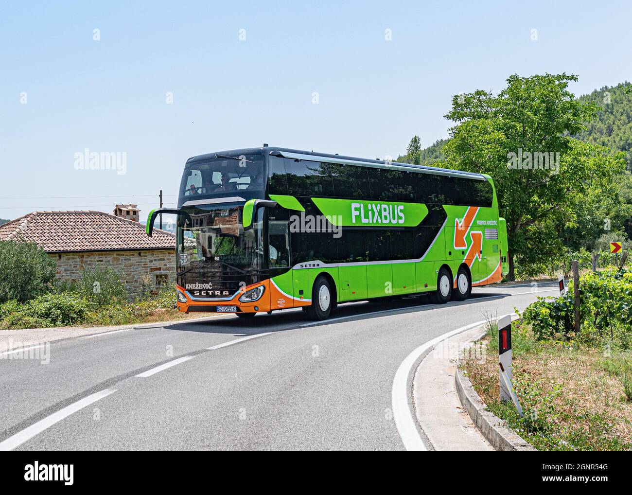 Tourist bus with tourists on the highway, in Skradin, Croatia Stock ...
