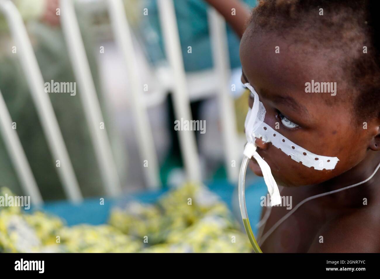 African hospital. Pediatric ward. Child in intensive care unit. Benin ...
