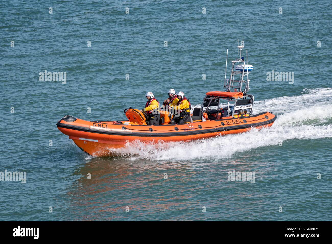 RNLI lifeboat and crew on the Thames Estuary approaching the lifeboat ...