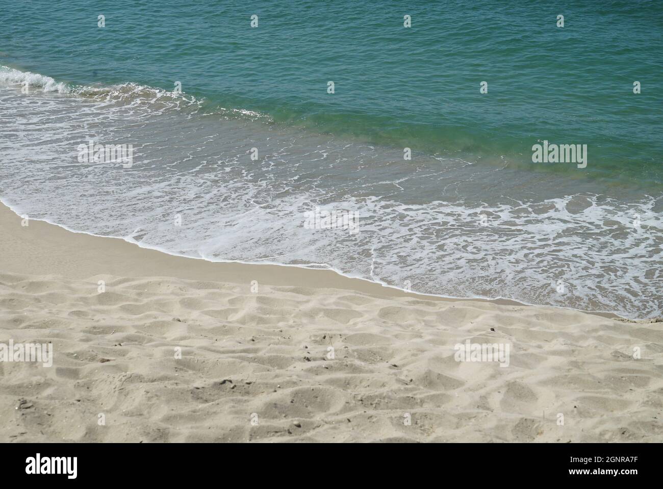 Beach near the sea water Stock Photo - Alamy