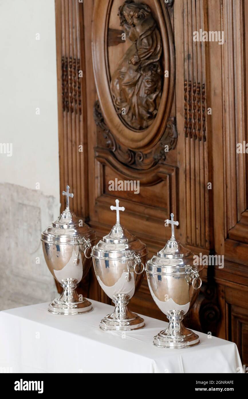 Saint Maurice church. Holy Thursday. Chrism Mass. Holy oils used in the ...