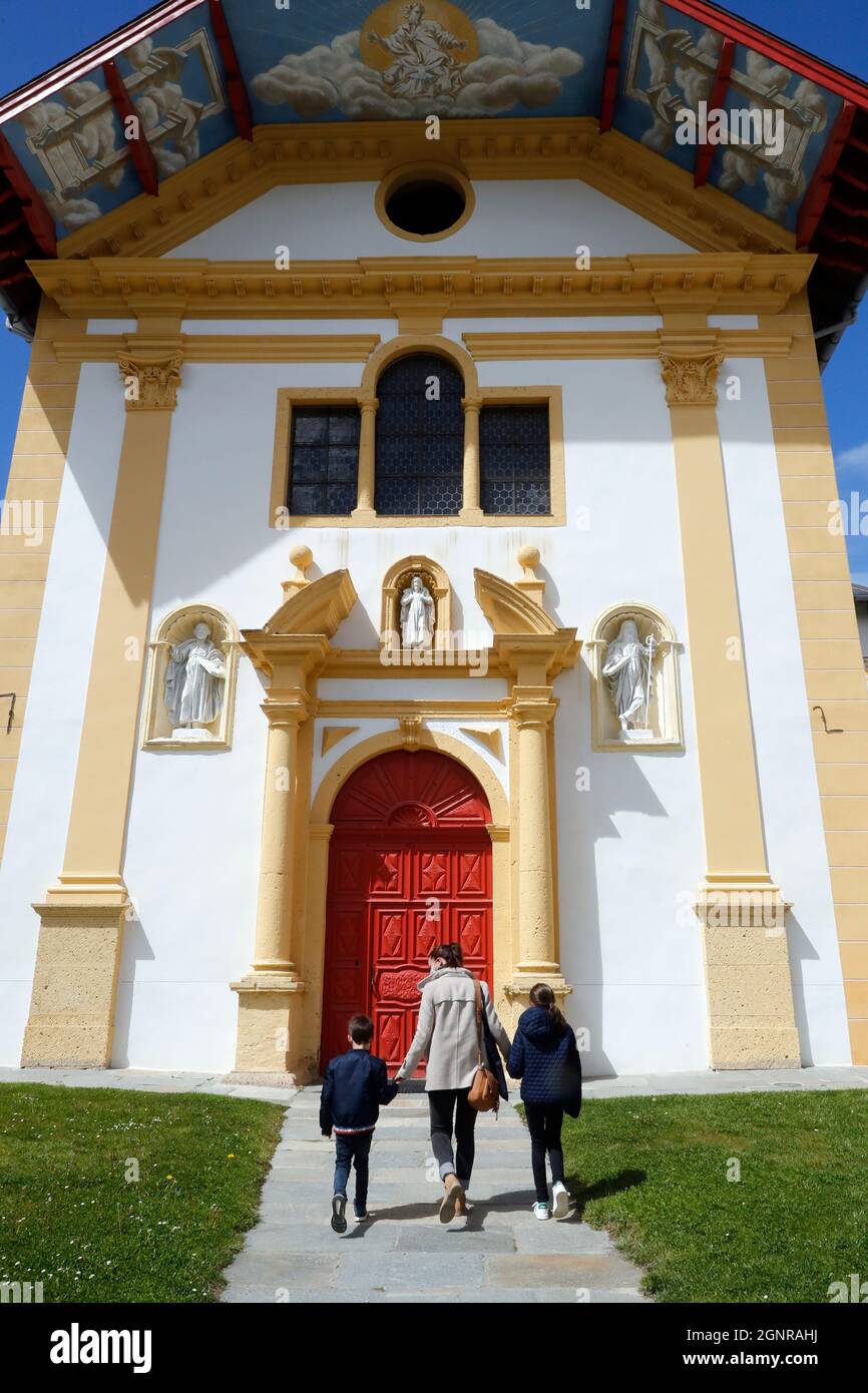 Saint Nicolas de Veroce church. Mother, daughter and son visiting the ...