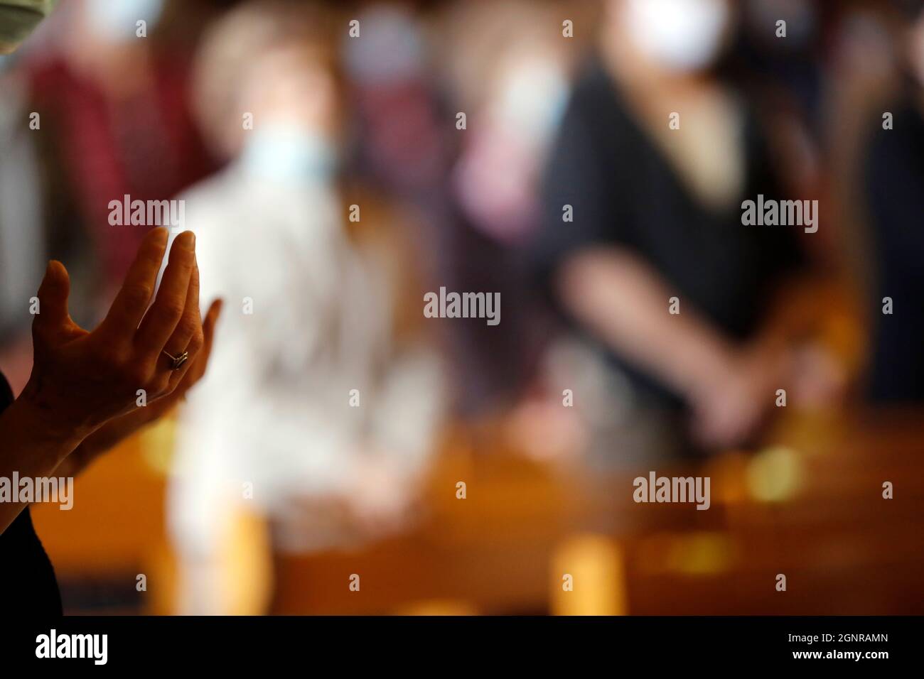 Notre Dame de Plaimpalais church. Catholic mass. Faithful saying Our ...